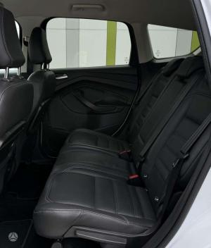 White Ford Kuga 2017 in Raseiniai, with an engine capacity of 2.00 L and mileage of 300 thousand km for 6499 €, photo 18 on AUTOMOTO.COM.LV