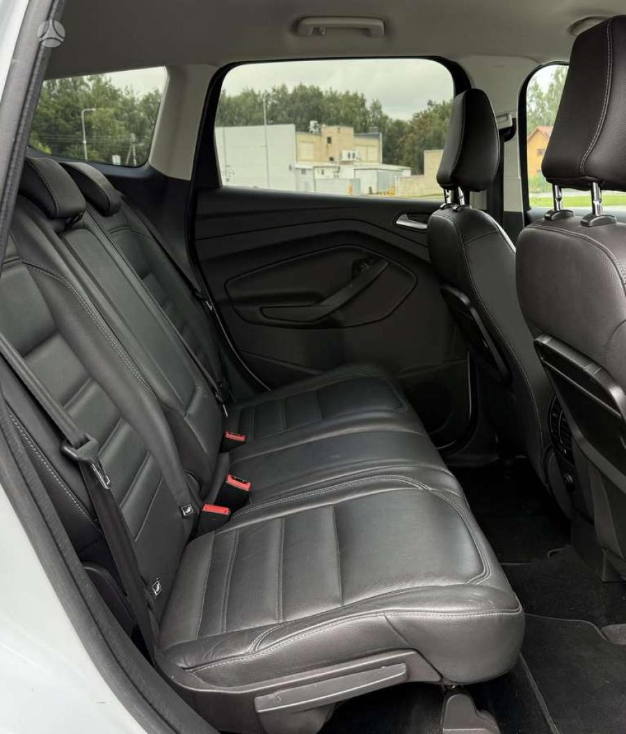 White Ford Kuga 2017 in Raseiniai, with an engine capacity of 2.00 L and mileage of 300 thousand km for 6499 €, photo 19 on AUTOMOTO.COM.LV