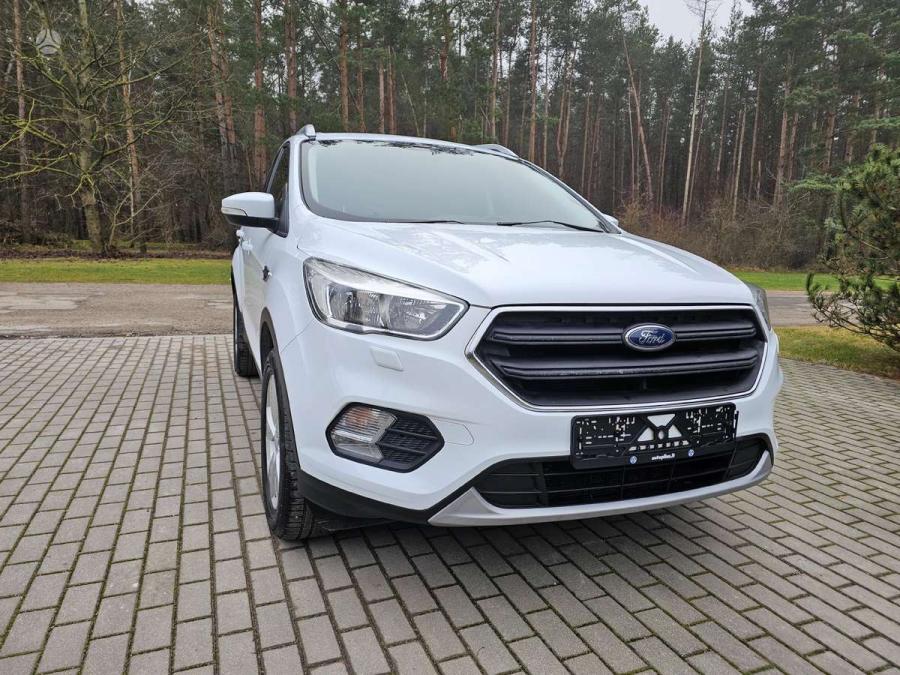 White Ford Kuga 2018 in Ukmerge, with an engine capacity of 1.50 L and mileage of 168 thousand km for 8900 €, photo 1 on AUTOMOTO.COM.LV