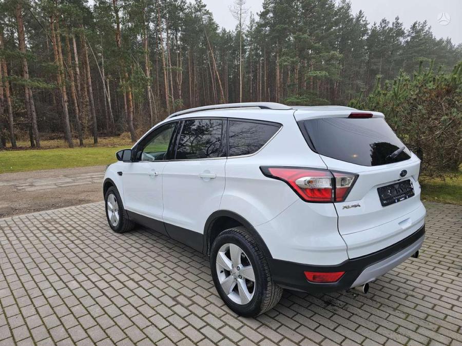 White Ford Kuga 2018 in Ukmerge, with an engine capacity of 1.50 L and mileage of 168 thousand km for 8900 €, photo 2 on AUTOMOTO.COM.LV
