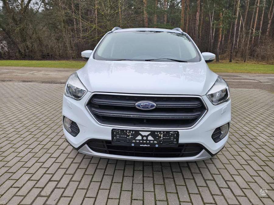 White Ford Kuga 2018 in Ukmerge, with an engine capacity of 1.50 L and mileage of 168 thousand km for 8900 €, photo 5 on AUTOMOTO.COM.LV