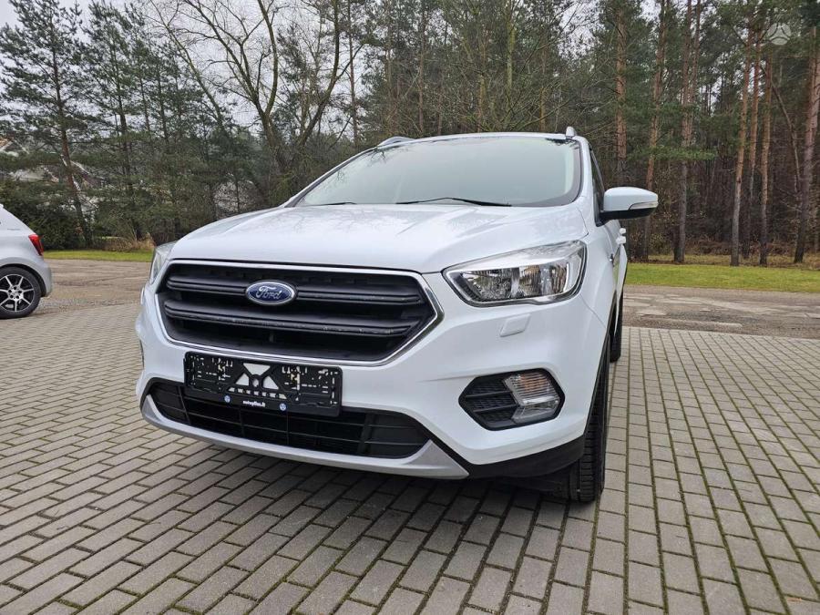 White Ford Kuga 2018 in Ukmerge, with an engine capacity of 1.50 L and mileage of 168 thousand km for 8900 €, photo 6 on AUTOMOTO.COM.LV