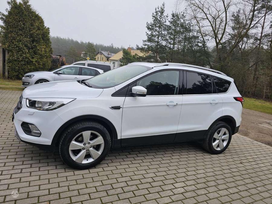 White Ford Kuga 2018 in Ukmerge, with an engine capacity of 1.50 L and mileage of 168 thousand km for 8900 €, photo 7 on AUTOMOTO.COM.LV