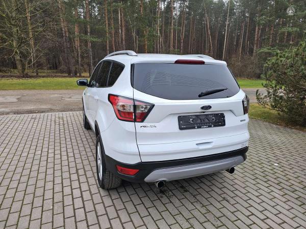 White Ford Kuga 2018 in Ukmerge, with an engine capacity of 1.50 L and mileage of 168 thousand km for 8900 €, photo 9 on AUTOMOTO.COM.LV