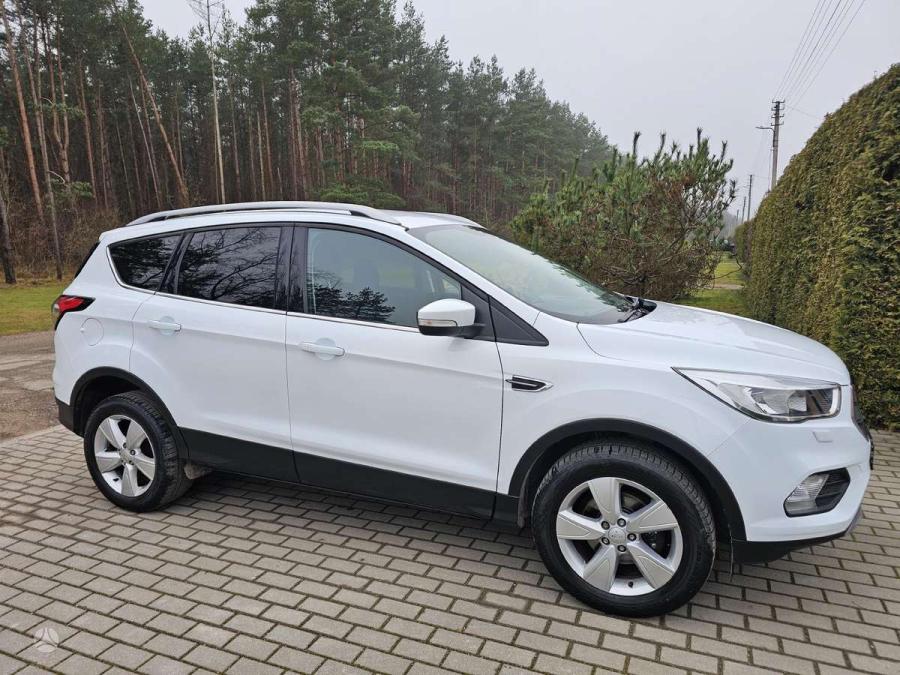 White Ford Kuga 2018 in Ukmerge, with an engine capacity of 1.50 L and mileage of 168 thousand km for 8900 €, photo 12 on AUTOMOTO.COM.LV
