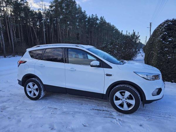 White Ford Kuga 2018 in Ukmerge, with an engine capacity of 1.50 L and mileage of 168 thousand km for 8300 €, photo 2 on AUTOMOTO.COM.LV
