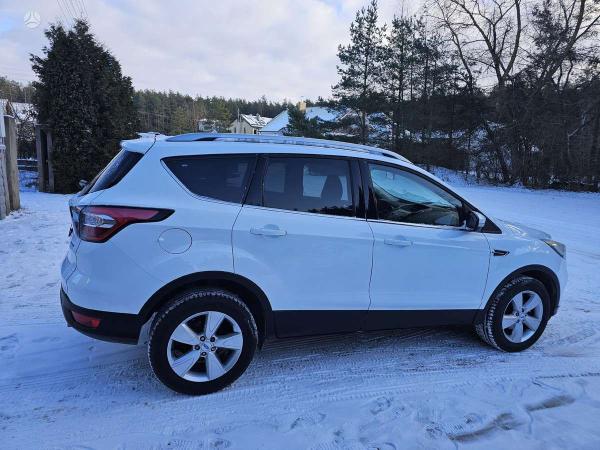 White Ford Kuga 2018 in Ukmerge, with an engine capacity of 1.50 L and mileage of 168 thousand km for 8300 €, photo 3 on AUTOMOTO.COM.LV