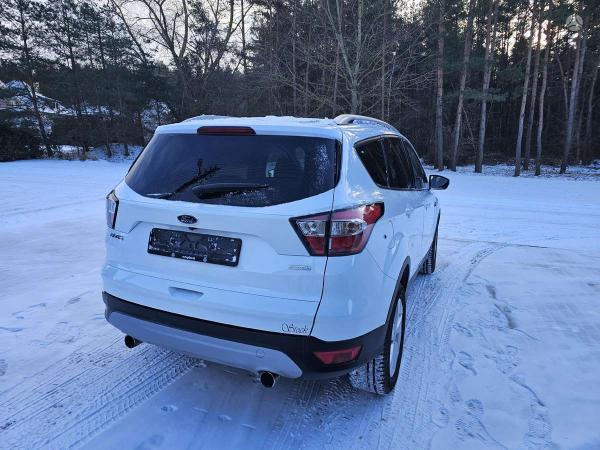 White Ford Kuga 2018 in Ukmerge, with an engine capacity of 1.50 L and mileage of 168 thousand km for 8300 €, photo 5 on AUTOMOTO.COM.LV