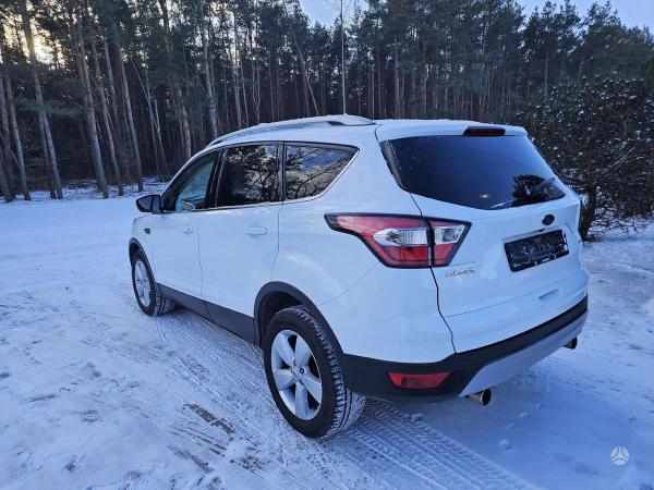 White Ford Kuga 2018 in Ukmerge, with an engine capacity of 1.50 L and mileage of 168 thousand km for 8300 €, photo 7 on AUTOMOTO.COM.LV