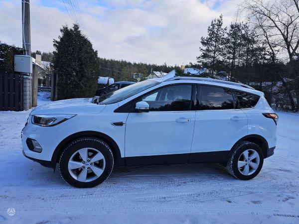 White Ford Kuga 2018 in Ukmerge, with an engine capacity of 1.50 L and mileage of 168 thousand km for 8300 €, photo 8 on AUTOMOTO.COM.LV