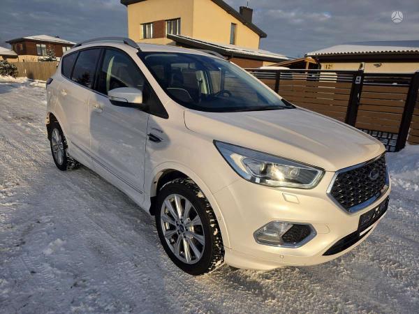 White Ford Kuga 2018 in Siauliai, with an engine capacity of 1.50 L and mileage of 163 thousand km for 13550 €, photo 4 on AUTOMOTO.COM.LV