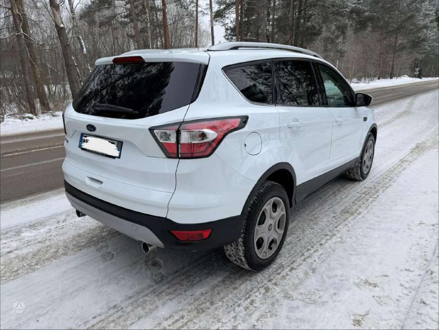 White Ford Kuga 2018 in Taurage, with an engine capacity of 1.50 L and mileage of 245 thousand km for 7900 €, photo 3 on AUTOMOTO.COM.LV