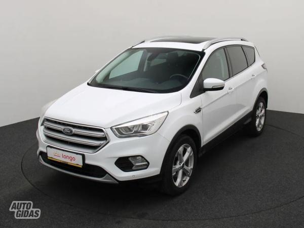 White Ford Kuga 2018 in Vilnius, with an engine capacity of 1.50 L and mileage of 102 thousand km for 12599 €, photo 1 on AUTOMOTO.COM.LV