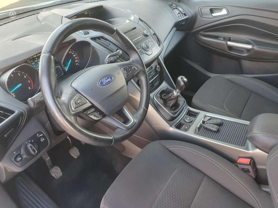 White Ford Kuga 2018 in Taurage, with an engine capacity of 1.50 L and mileage of 174 thousand km for 6950 €, photo 18 on AUTOMOTO.COM.LV