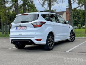 White Ford Kuga 2018 in Cesis, with an engine capacity of 2.00 L and mileage of 259 thousand km for 11500 €, photo 5 on AUTOMOTO.COM.LV