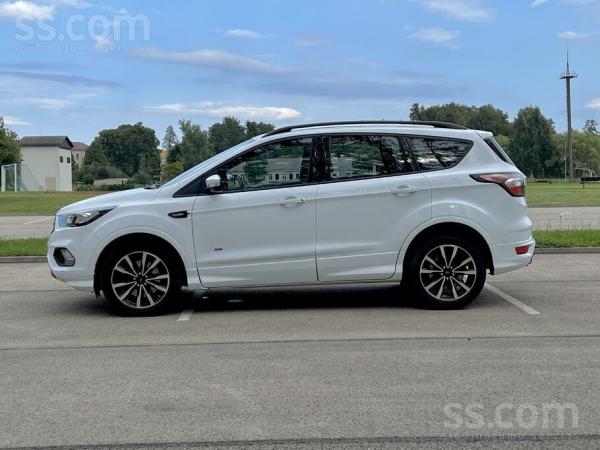 White Ford Kuga 2018 in Cesis, with an engine capacity of 2.00 L and mileage of 259 thousand km for 11500 €, photo 5 on AUTOMOTO.COM.LV