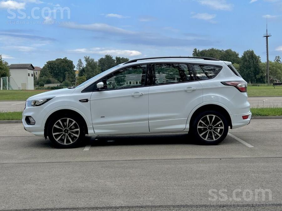 White Ford Kuga 2018 in Cesis, with an engine capacity of 2.00 L and mileage of 259 thousand km for 11500 €, photo 6 on AUTOMOTO.COM.LV