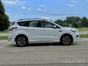 White Ford Kuga 2018 in Cesis, with an engine capacity of 2.00 L and mileage of 259 thousand km for 11500 €, photo 7 on AUTOMOTO.COM.LV