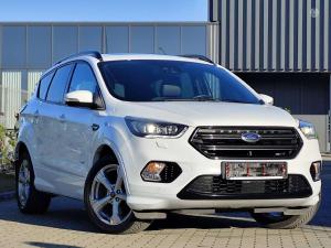 White Ford Kuga 2019 in Siauliai, with an engine capacity of 1.50 L and mileage of 107 thousand km for 12900 €, photo  on AUTOMOTO.COM.LV