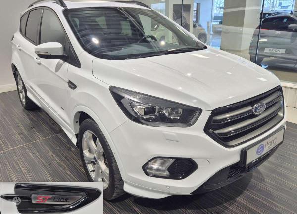 White Ford Kuga 2019 in Siauliai, with an engine capacity of 1.50 L and mileage of 107 thousand km for 13600 €, photo 1 on AUTOMOTO.COM.LV
