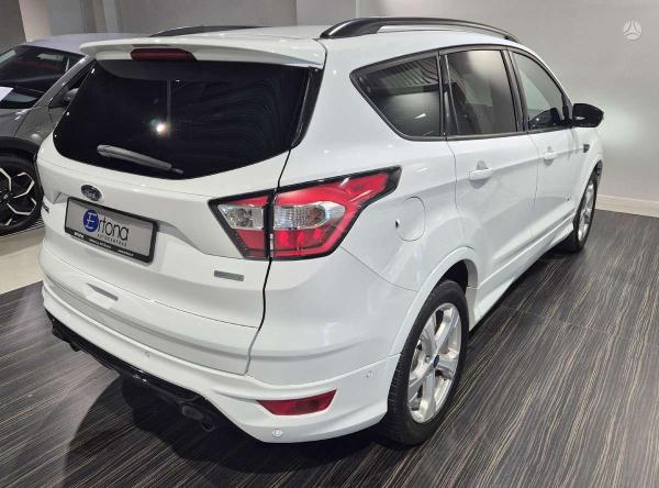 White Ford Kuga 2019 in Siauliai, with an engine capacity of 1.50 L and mileage of 107 thousand km for 13600 €, photo 4 on AUTOMOTO.COM.LV