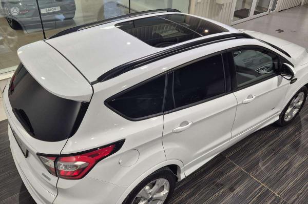 White Ford Kuga 2019 in Siauliai, with an engine capacity of 1.50 L and mileage of 107 thousand km for 13600 €, photo 7 on AUTOMOTO.COM.LV