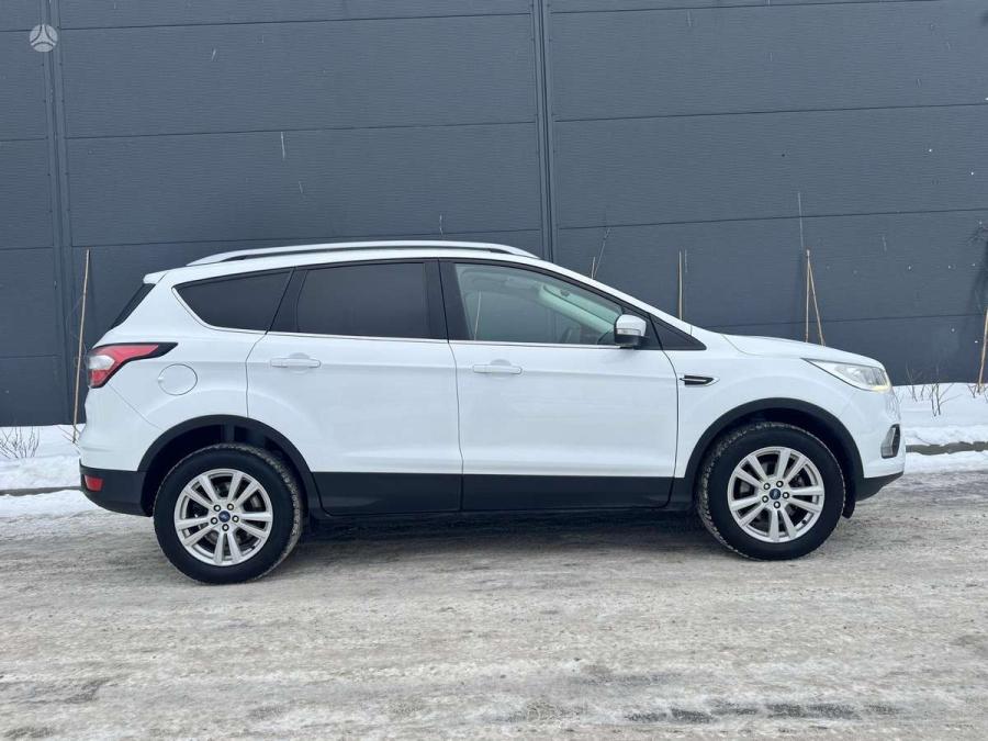 White Ford Kuga 2019 in Vilnius, with an engine capacity of 1.50 L and mileage of 72 thousand km for 14950 €, photo 4 on AUTOMOTO.COM.LV