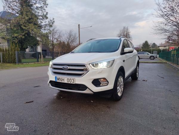 White Ford Kuga 2019 in Kaunas, with an engine capacity of 2.00 L and mileage of 202 thousand km for 13000 €, photo 5 on AUTOMOTO.COM.LV