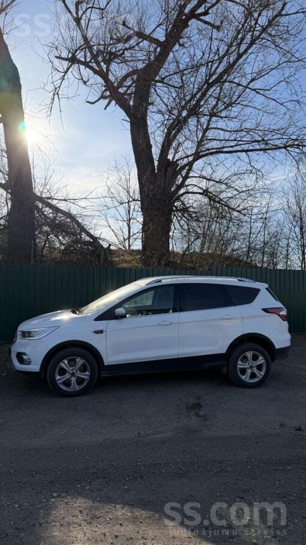 White Ford Kuga 2019 in Daugavpils, with an engine capacity of 2.00 L and mileage of 230 thousand km for 10900 €, photo 3 on AUTOMOTO.COM.LV
