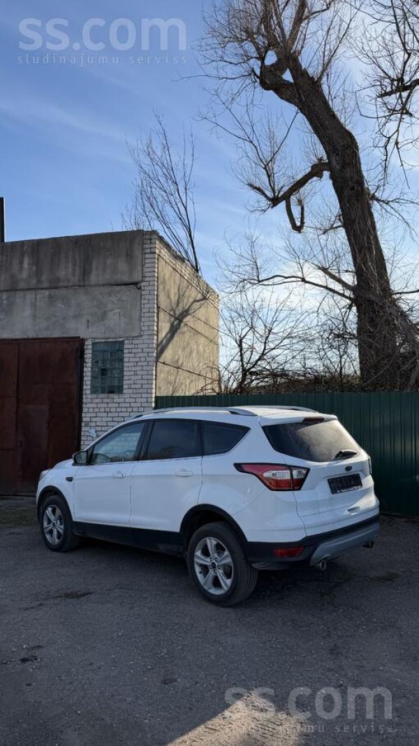 White Ford Kuga 2019 in Daugavpils, with an engine capacity of 2.00 L and mileage of 230 thousand km for 10900 €, photo 4 on AUTOMOTO.COM.LV