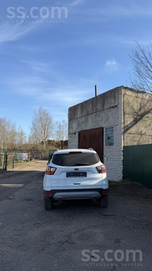 White Ford Kuga 2019 in Daugavpils, with an engine capacity of 2.00 L and mileage of 230 thousand km for 10900 €, photo 5 on AUTOMOTO.COM.LV