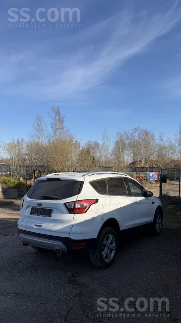 White Ford Kuga 2019 in Daugavpils, with an engine capacity of 2.00 L and mileage of 230 thousand km for 10900 €, photo 6 on AUTOMOTO.COM.LV