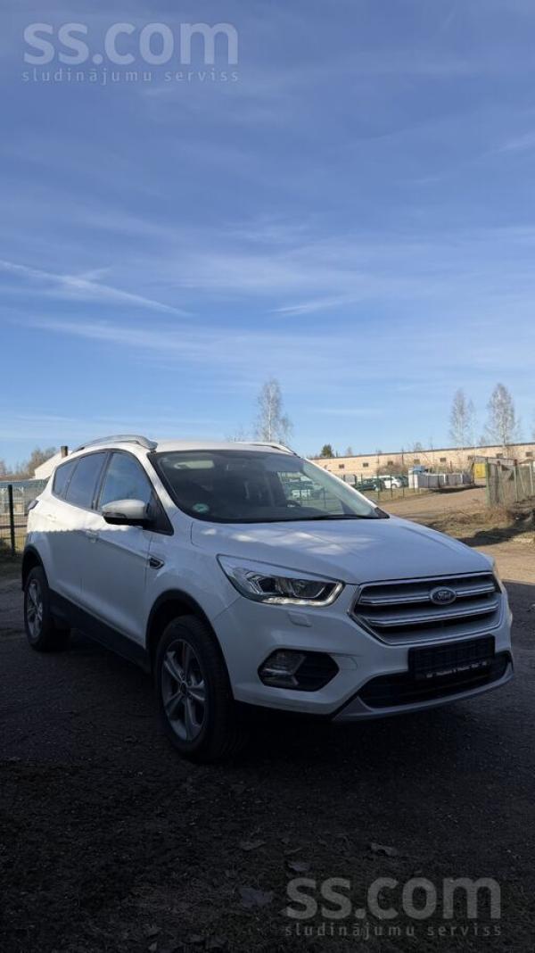 White Ford Kuga 2019 in Daugavpils, with an engine capacity of 2.00 L and mileage of 230 thousand km for 10900 €, photo 7 on AUTOMOTO.COM.LV