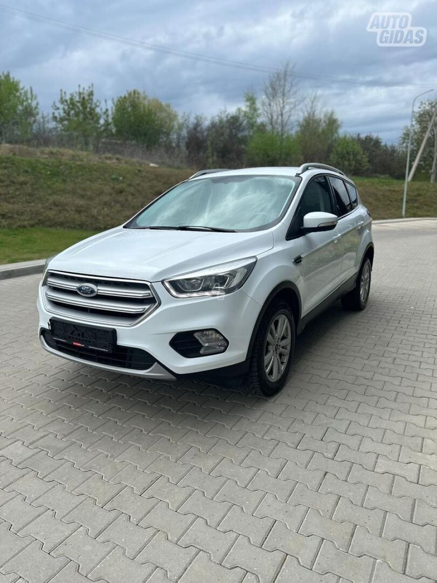 White Ford Kuga 2019 in Vilnius, with an engine capacity of 1.50 L and mileage of 72 thousand km for 11950 €, photo 1 on AUTOMOTO.COM.LV