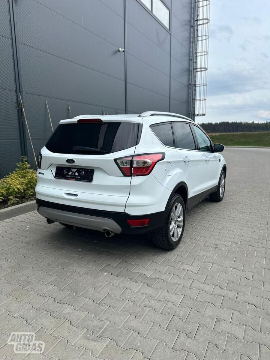 White Ford Kuga 2019 in Vilnius, with an engine capacity of 1.50 L and mileage of 72 thousand km for 11950 €, photo 8 on AUTOMOTO.COM.LV