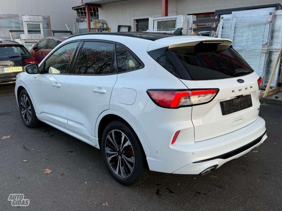 White Ford Kuga 2020 in Kaunas, with an engine capacity of 2.50 L and mileage of 95 thousand km for 21885 €, photo 6 on AUTOMOTO.COM.LV