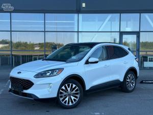White Ford Kuga 2020 in Panevezys, with an engine capacity of 2.50 L and mileage of 53 thousand km for 20700 €, photo 4 on AUTOMOTO.COM.LV