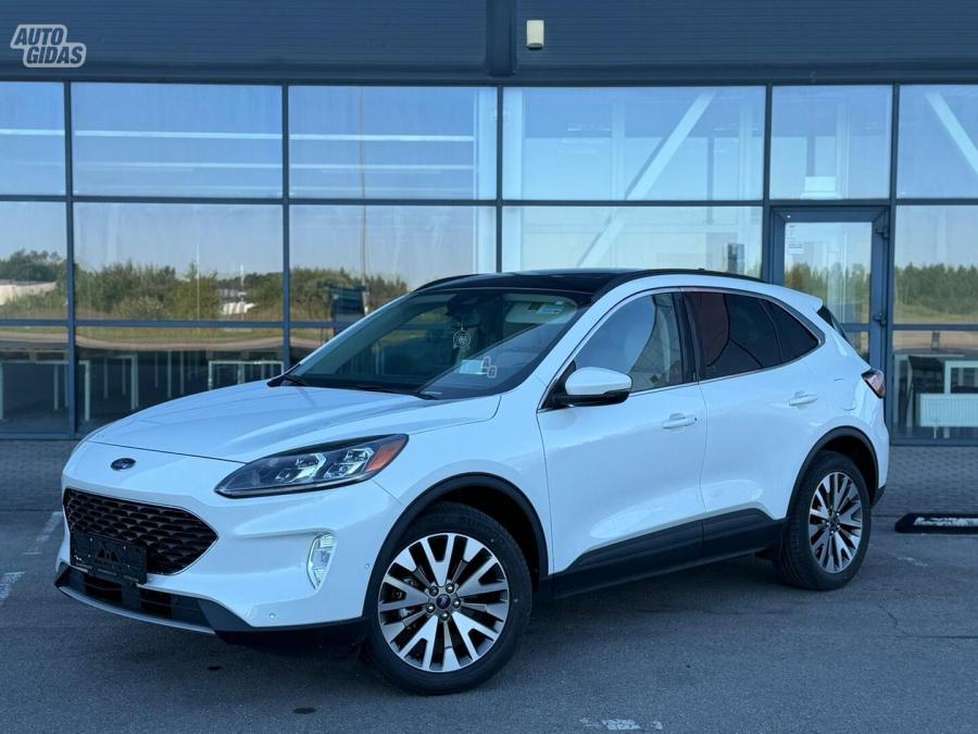 White Ford Kuga 2020 in Panevezys, with an engine capacity of 2.50 L and mileage of 53 thousand km for 20700 €, photo 4 on AUTOMOTO.COM.LV