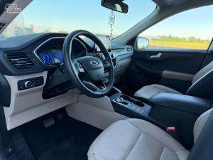 White Ford Kuga 2020 in Panevezys, with an engine capacity of 2.50 L and mileage of 53 thousand km for 20700 €, photo 12 on AUTOMOTO.COM.LV