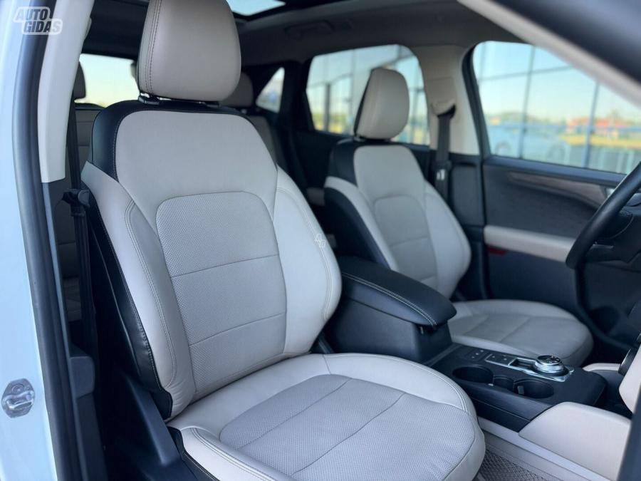 White Ford Kuga 2020 in Panevezys, with an engine capacity of 2.50 L and mileage of 53 thousand km for 20700 €, photo 14 on AUTOMOTO.COM.LV