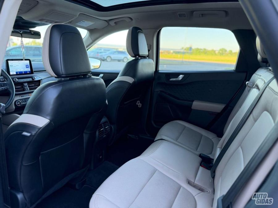 White Ford Kuga 2020 in Panevezys, with an engine capacity of 2.50 L and mileage of 53 thousand km for 20700 €, photo 15 on AUTOMOTO.COM.LV