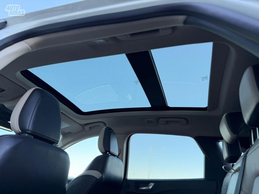 White Ford Kuga 2020 in Panevezys, with an engine capacity of 2.50 L and mileage of 53 thousand km for 20700 €, photo 16 on AUTOMOTO.COM.LV
