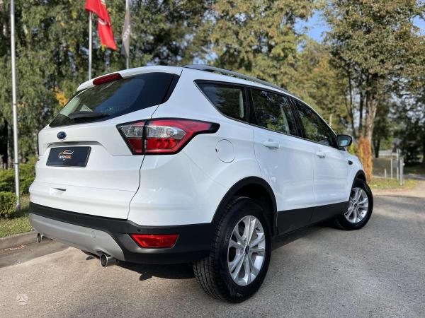 Ford Kuga 2020 in Kazlu Ruda on AUTOMOTO.COM.LV White Ford Kuga 2020 in Kazlu Ruda, with an engine capacity of 1.50 L and mileage of 158 thousand km for 9000 €, photo 8 on AUTOMOTO.COM.LV