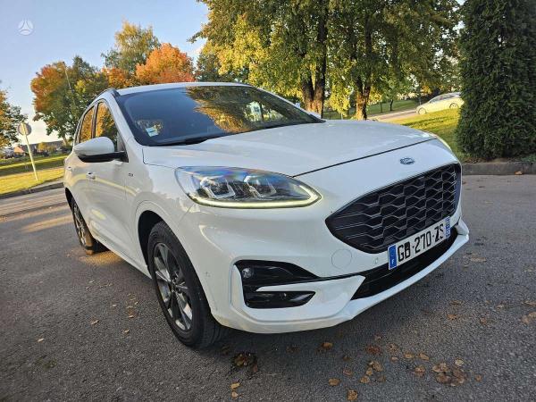 White Ford Kuga 2021 in Taurage, with an engine capacity of 2.00 L and mileage of 234 thousand km for 15000 €, photo 11 on AUTOMOTO.COM.LV