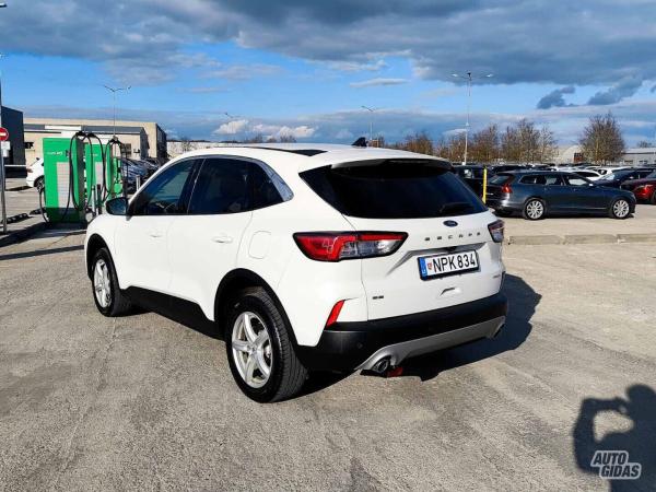 White Ford Kuga 2022 in Siauliai, with an engine capacity of 1.50 L and mileage of 125 thousand km for 11700 €, photo 5 on AUTOMOTO.COM.LV