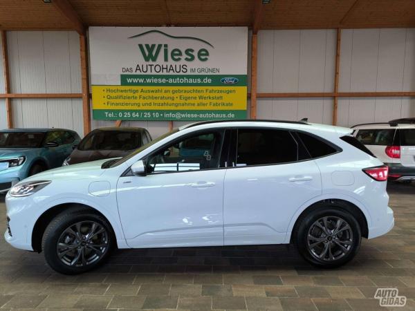 White Ford Kuga 2023 in Kaunas, with an engine capacity of 2.50 L and mileage of 30 thousand km for 30391 €, photo 1 on AUTOMOTO.COM.LV