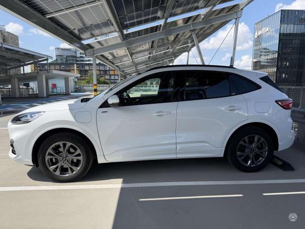 Ford Kuga 2023 Viļņa vietnē Balts Ford Kuga 2023 Viļņa, ar dzinēja tilpumu 2.49 L un nobraukumu 61 tūkst. km par 21990 €, foto 4 vietnē AUTOMOTO.COM.LV