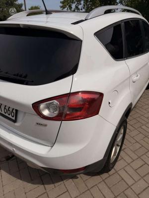 White Ford Kuga 2009 in Rokiskis, with an engine capacity of 2.00 L and mileage of 311 thousand km for 4200 €, photo 14 on AUTOMOTO.COM.LV