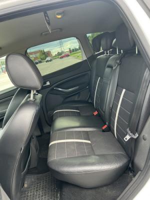White Ford Kuga 2012 in Narva, with an engine capacity of 2.00 L and mileage of 216 thousand km for 3999 €, photo 12 on AUTOMOTO.COM.LV