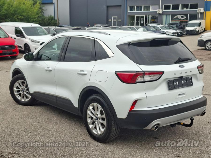 White Ford Kuga 2022 in Tartu, with an engine capacity of 1.50 L and mileage of 170 thousand km for 14999 €, photo 4 on AUTOMOTO.COM.LV